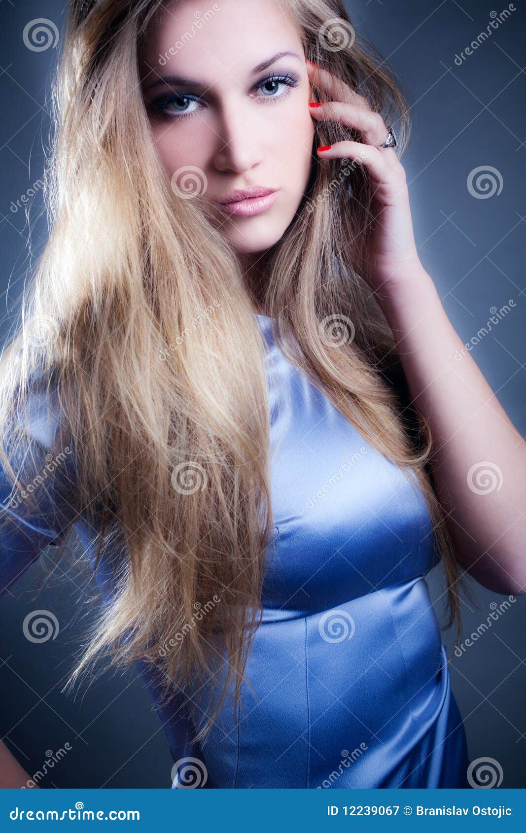 Beauty in blue stock image. Image of studio, model, woman - 12239067