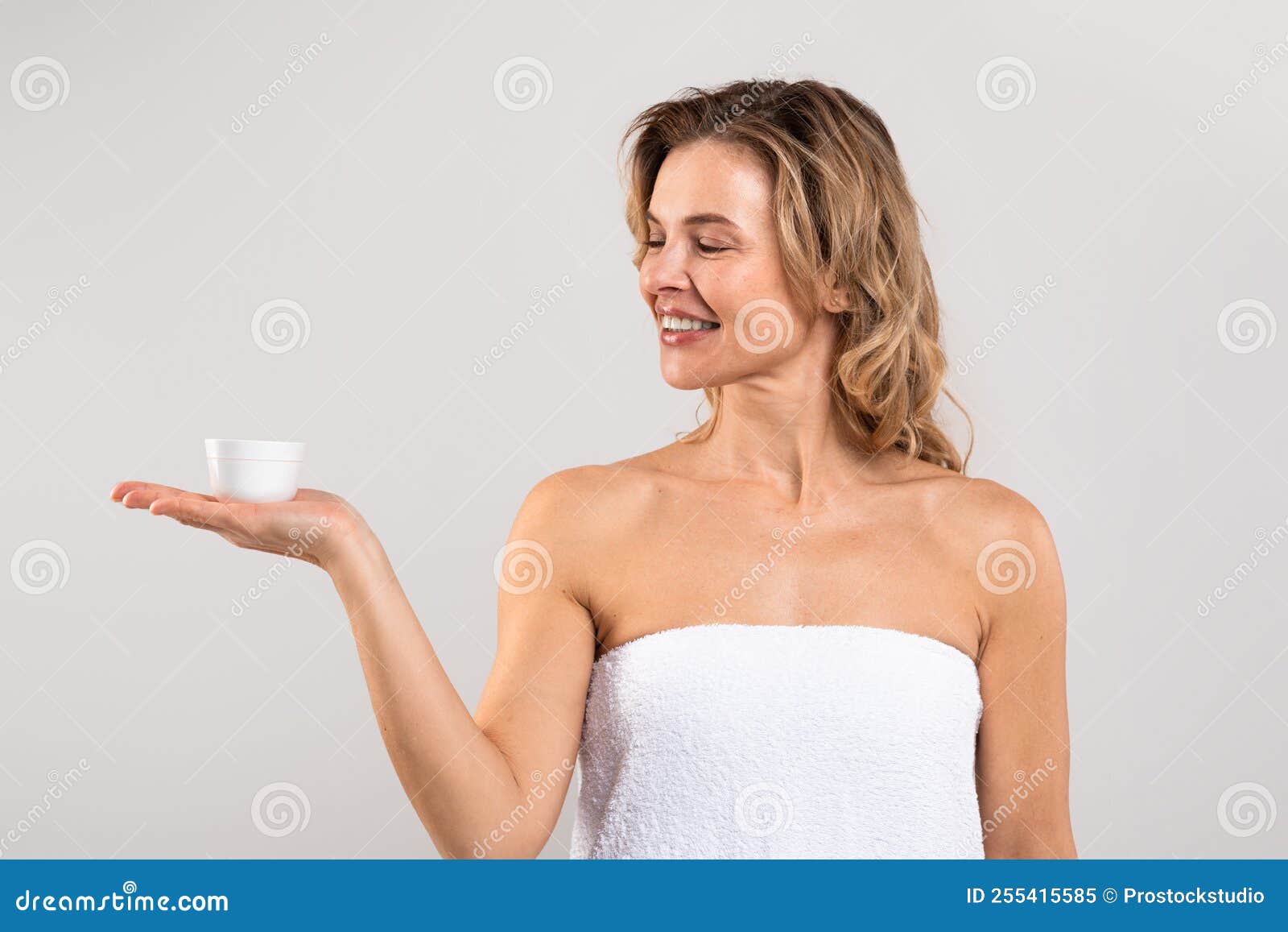 Beauty Care For Aged Skin Middle Aged Woman Holding Jar With Cream