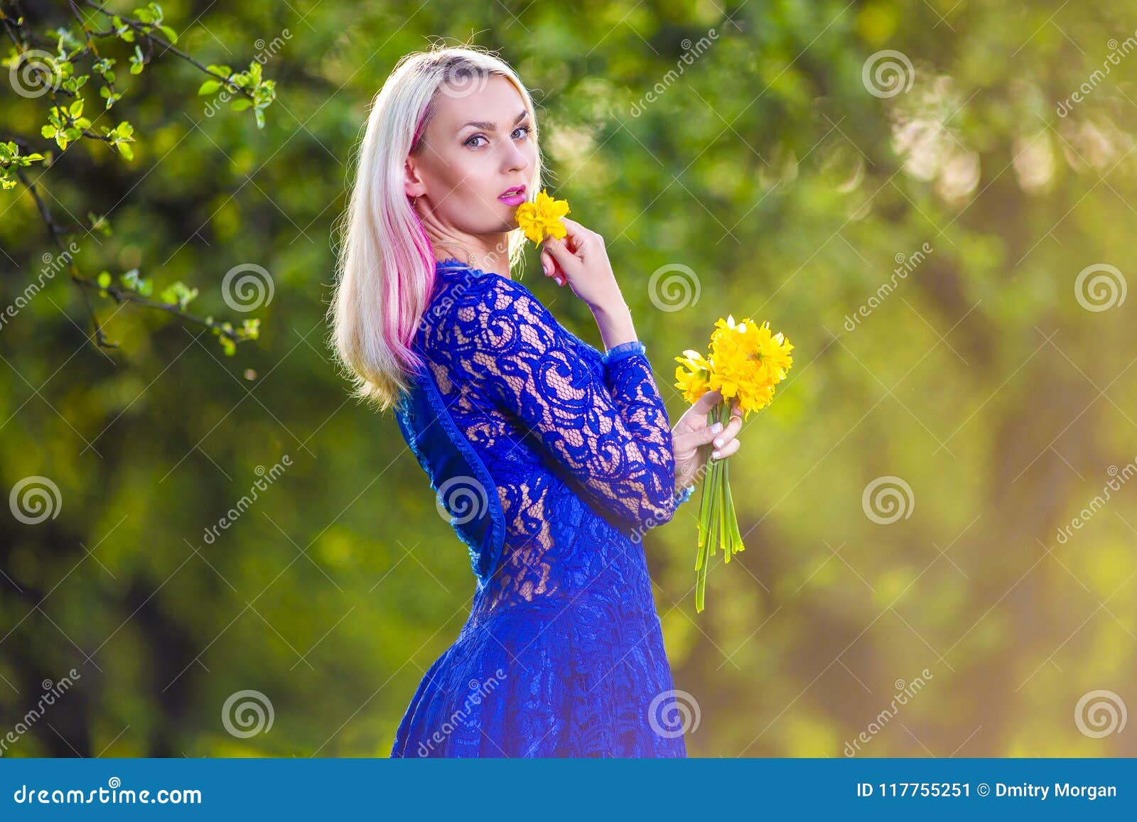 Beauty Concepts Happy Positive Caucasian Blond With Bunch Of Daffodils