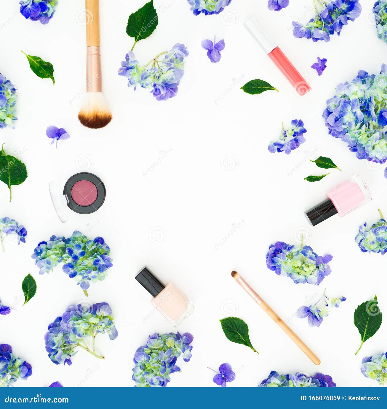 Beauty Frame Composition of Blue Flowers with Cosmetics on White ...