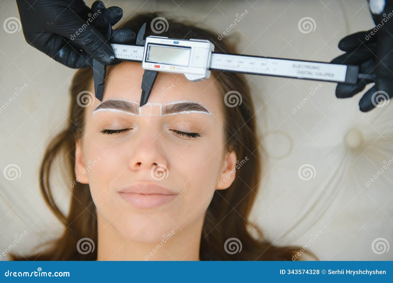 Beauty Master Measuring Eyebrows with Calipers before Powder Permanent ...