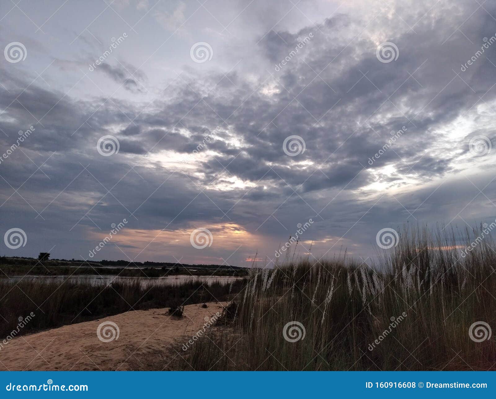 BEAUTY of NATURE. SUNSET RIVER SIDE FULL of SAND Stock Photo - Image of ...