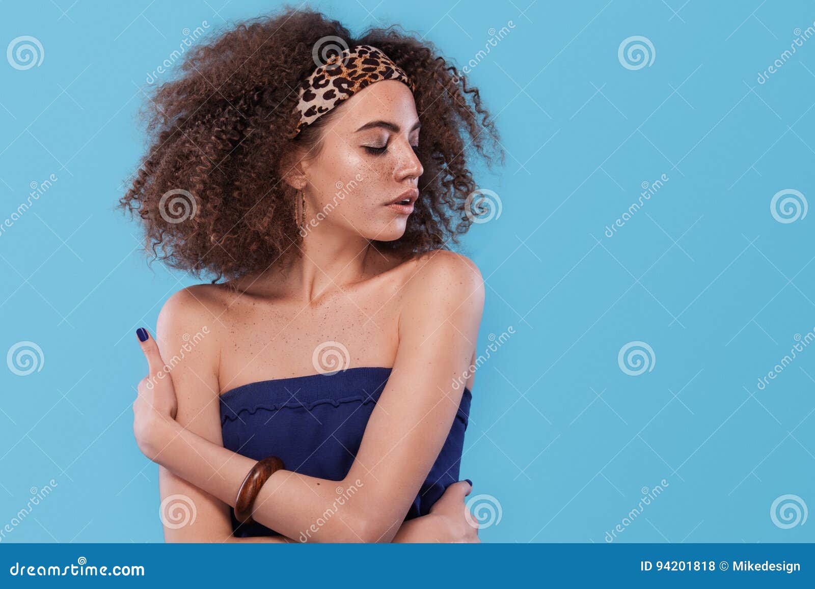 Beauty Portrait Of Girl With Afro Hairstyle Girl Posing On Blue