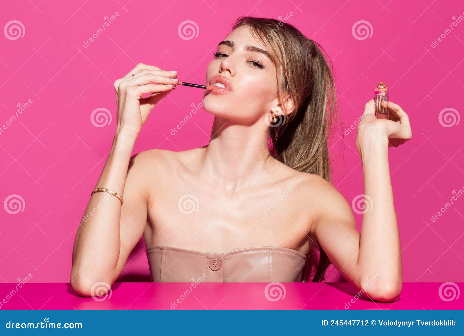 Beauty Portrait Of Girl With Make Up Young Woman Applies Lipstick On