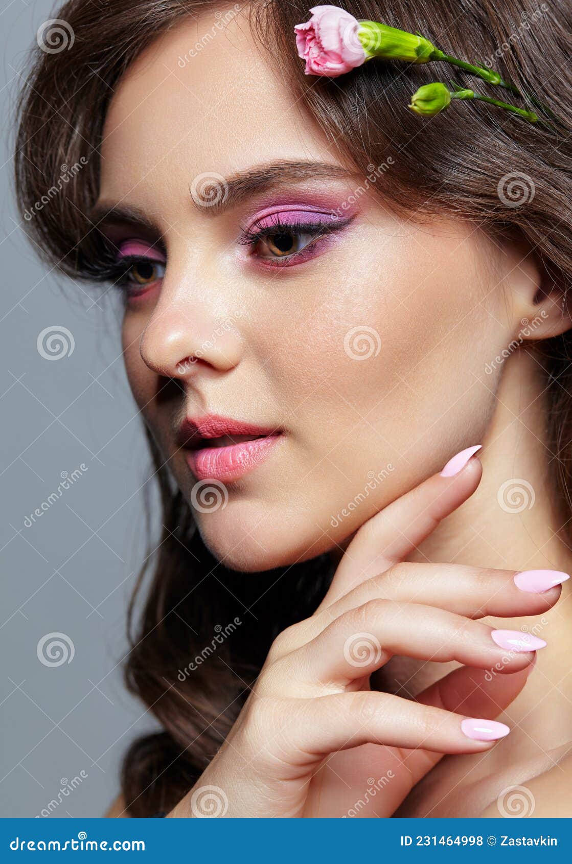 Beauty Portrait Of Young Woman Pink Carnation Flower In Hairs Stock