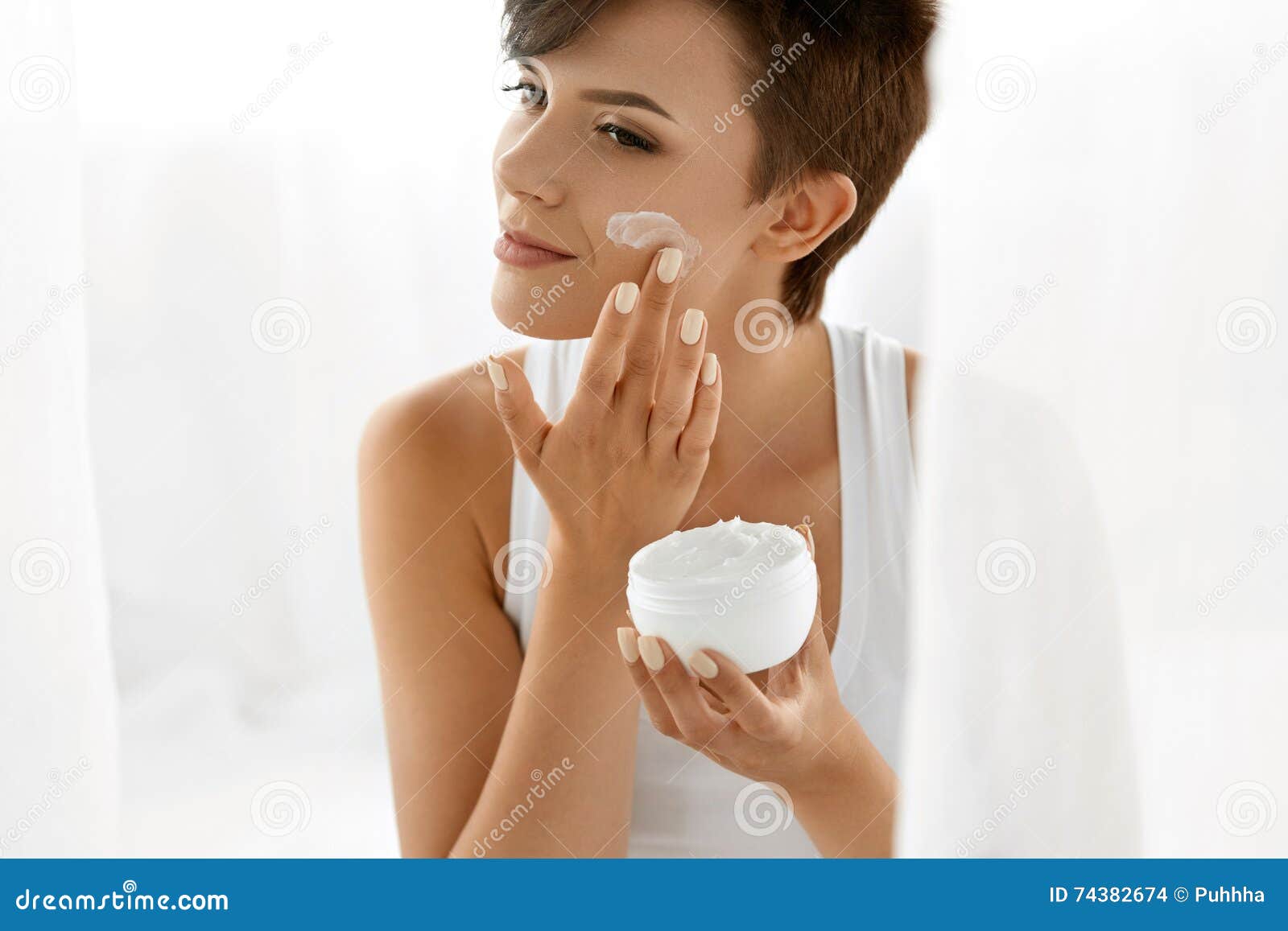 Beauty Skin Care Beautiful Woman Applying Cosmetic Face Cream Stock