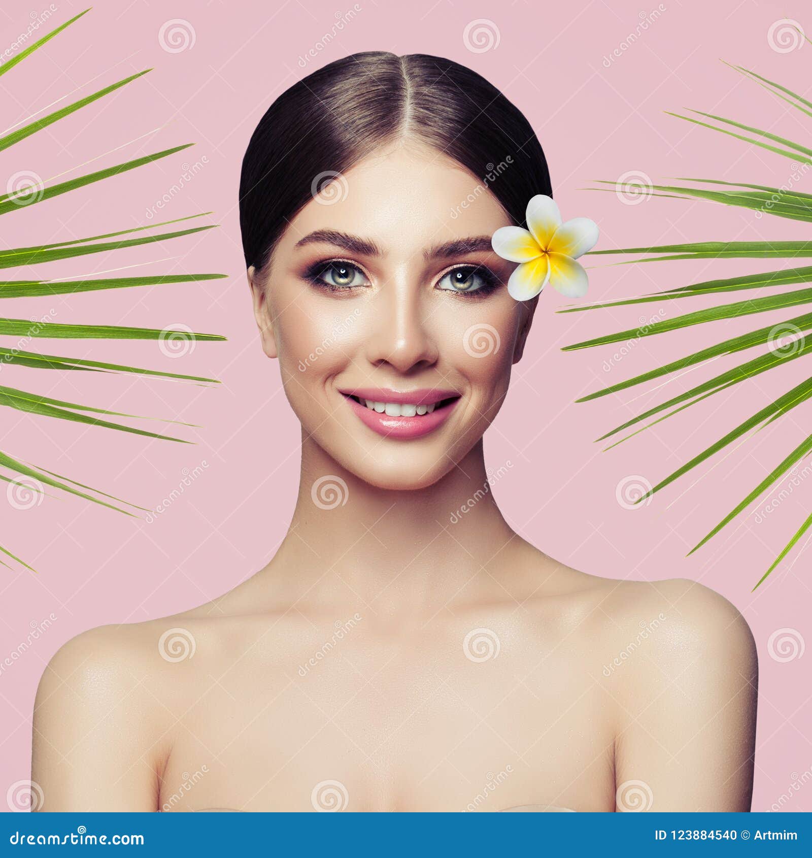 Beauty Smiling Spa Model With Natural Make Up And Green Leaves Stock