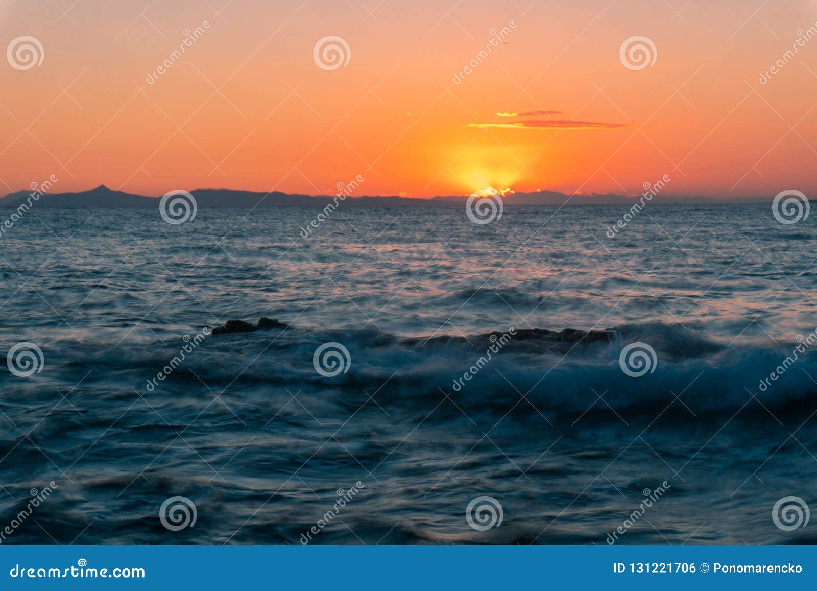 Beauty sunset at the ocean stock photo. Image of background - 131221706