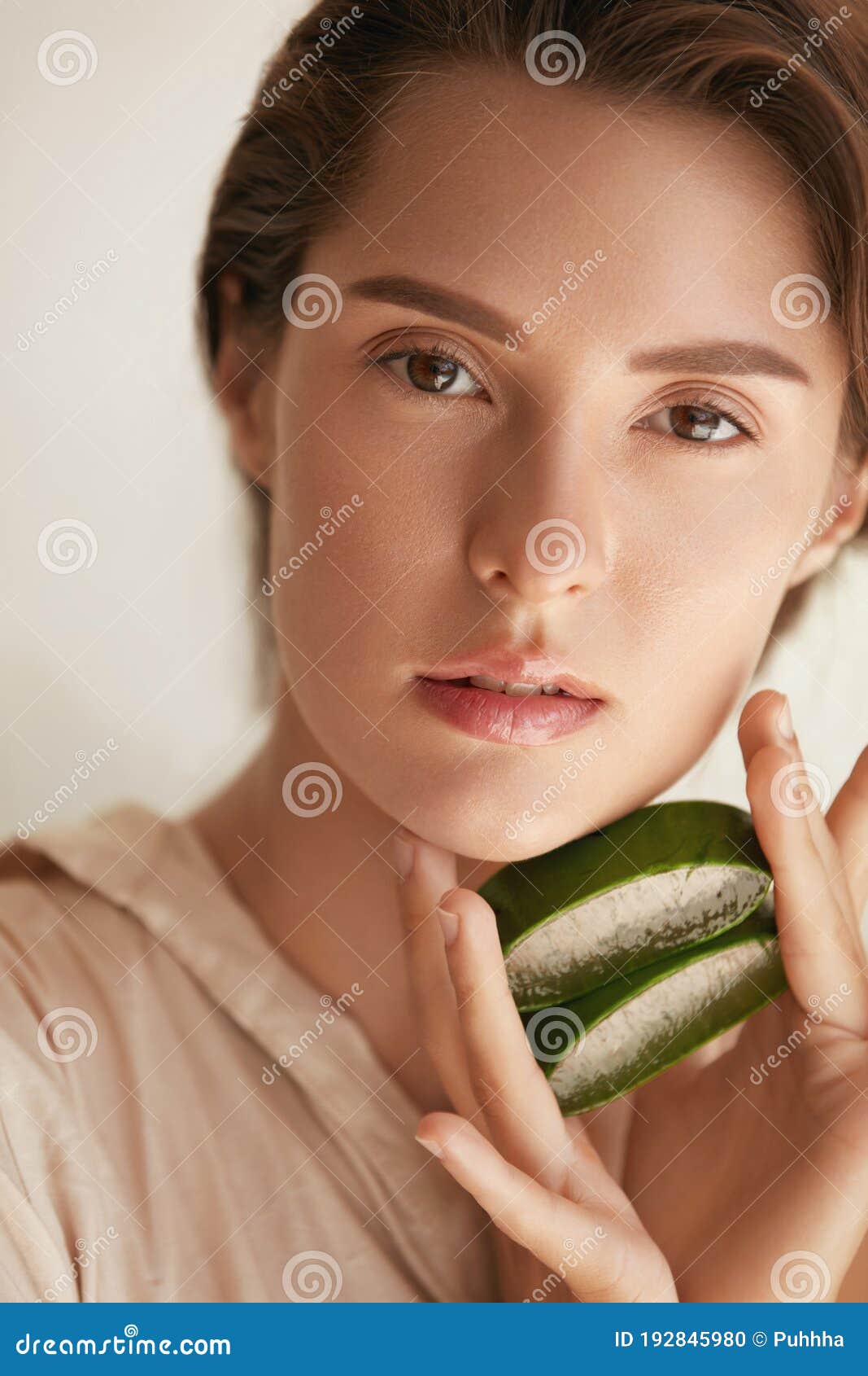Beauty Woman With Aloe Vera Portrait Beautiful Model Holding Slices