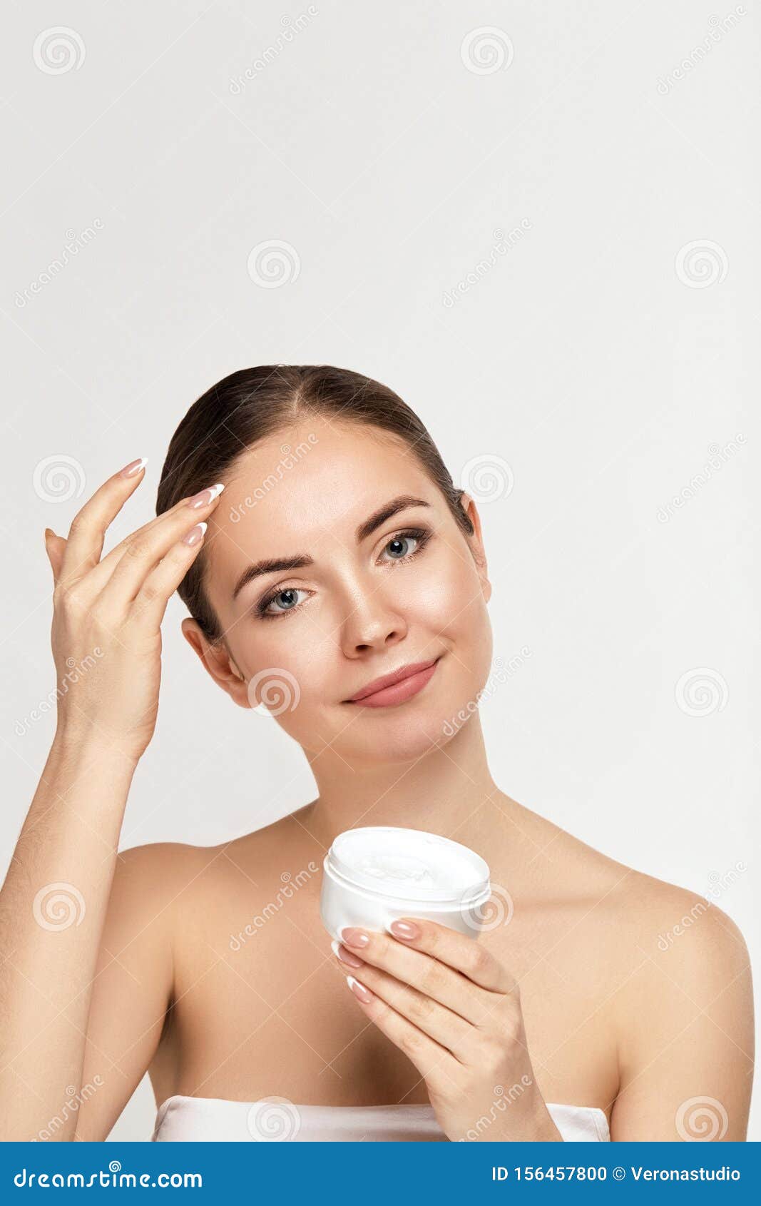 Beauty Woman Concept Skin Care Portrait Of Female Model Holding And
