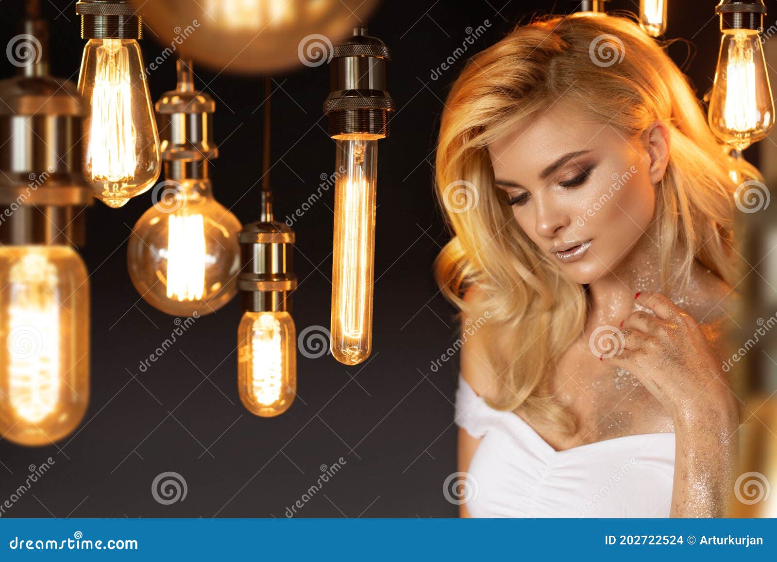 Beauty Woman with Light Bulbs Stock Photo - Image of eureka, hold ...