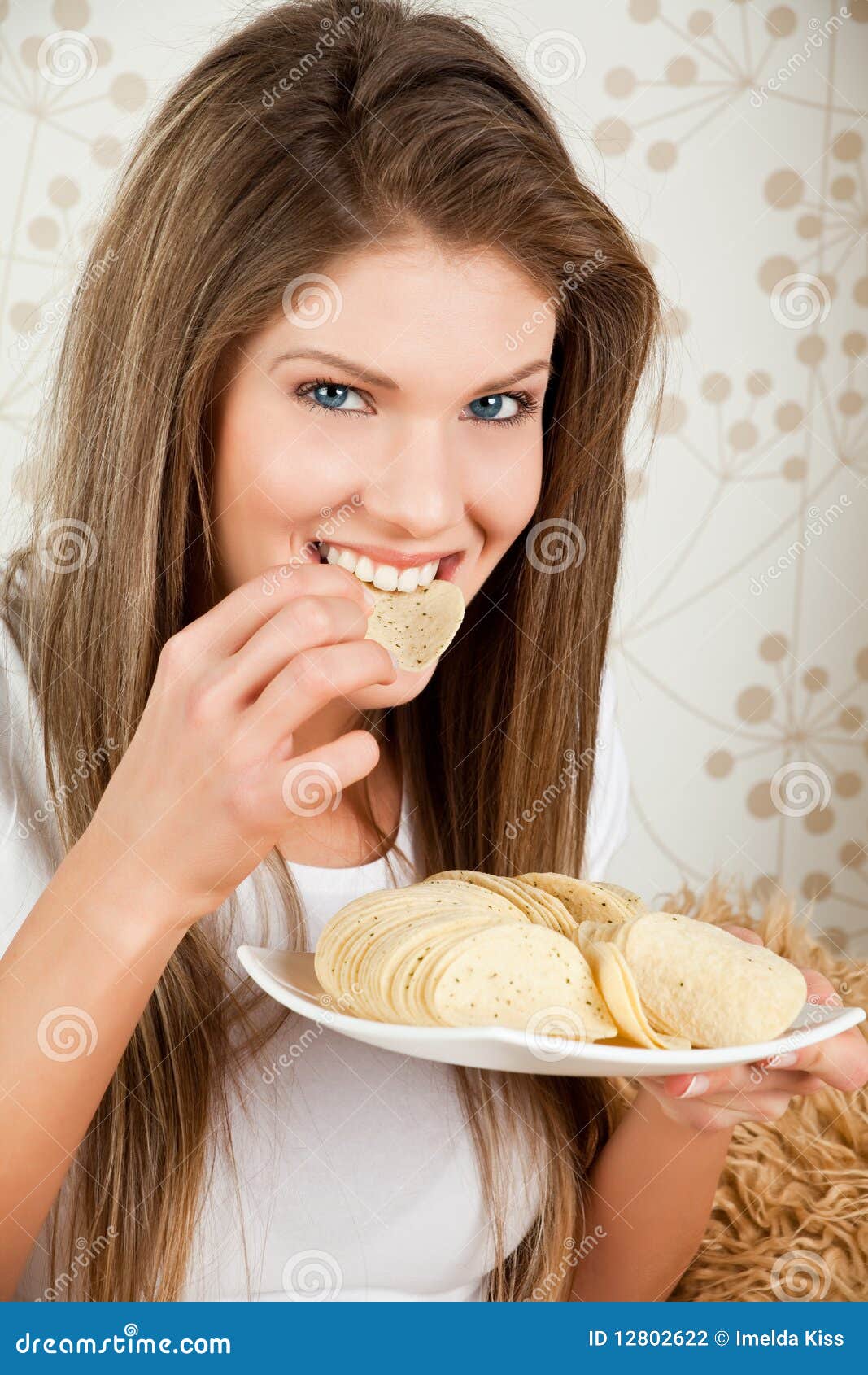 Beauty women eating chips stock photo. Image of diet - 12802622