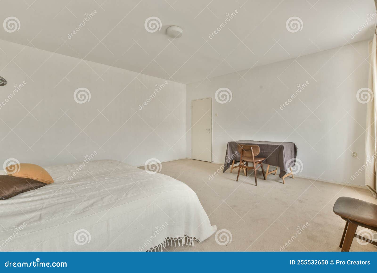 Bed and Bedside Table Near Window Stock Photo - Image of balcony, table ...