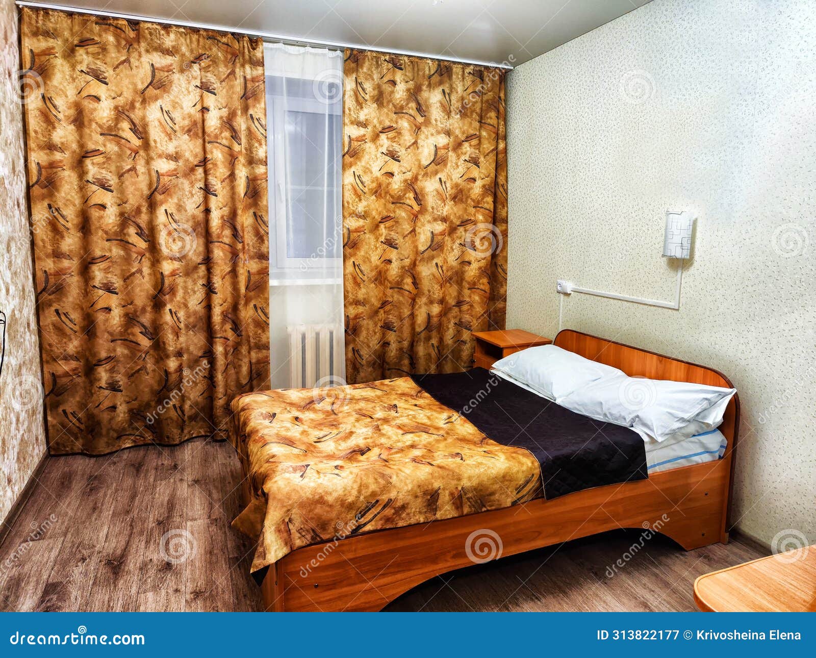 Bed in a Cozy Hotel Room. Background with Room of Small, Poor Hotel or ...