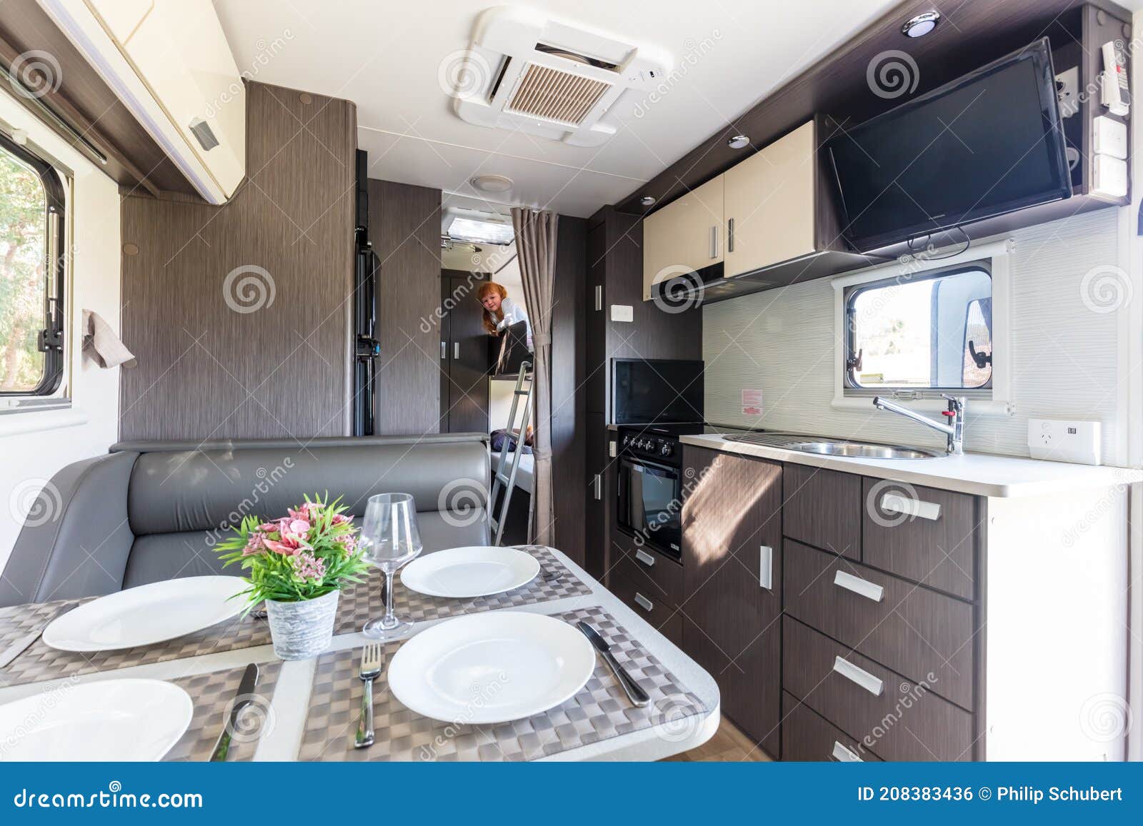 Bed and Dining Area in a Modern Caravan Stock Photo - Image of camping ...