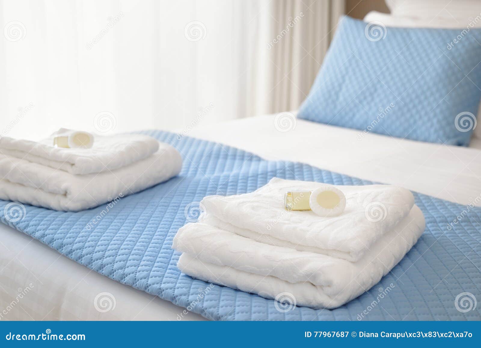 Bed with fresh towels stock image. Image of holiday, interior - 77967687