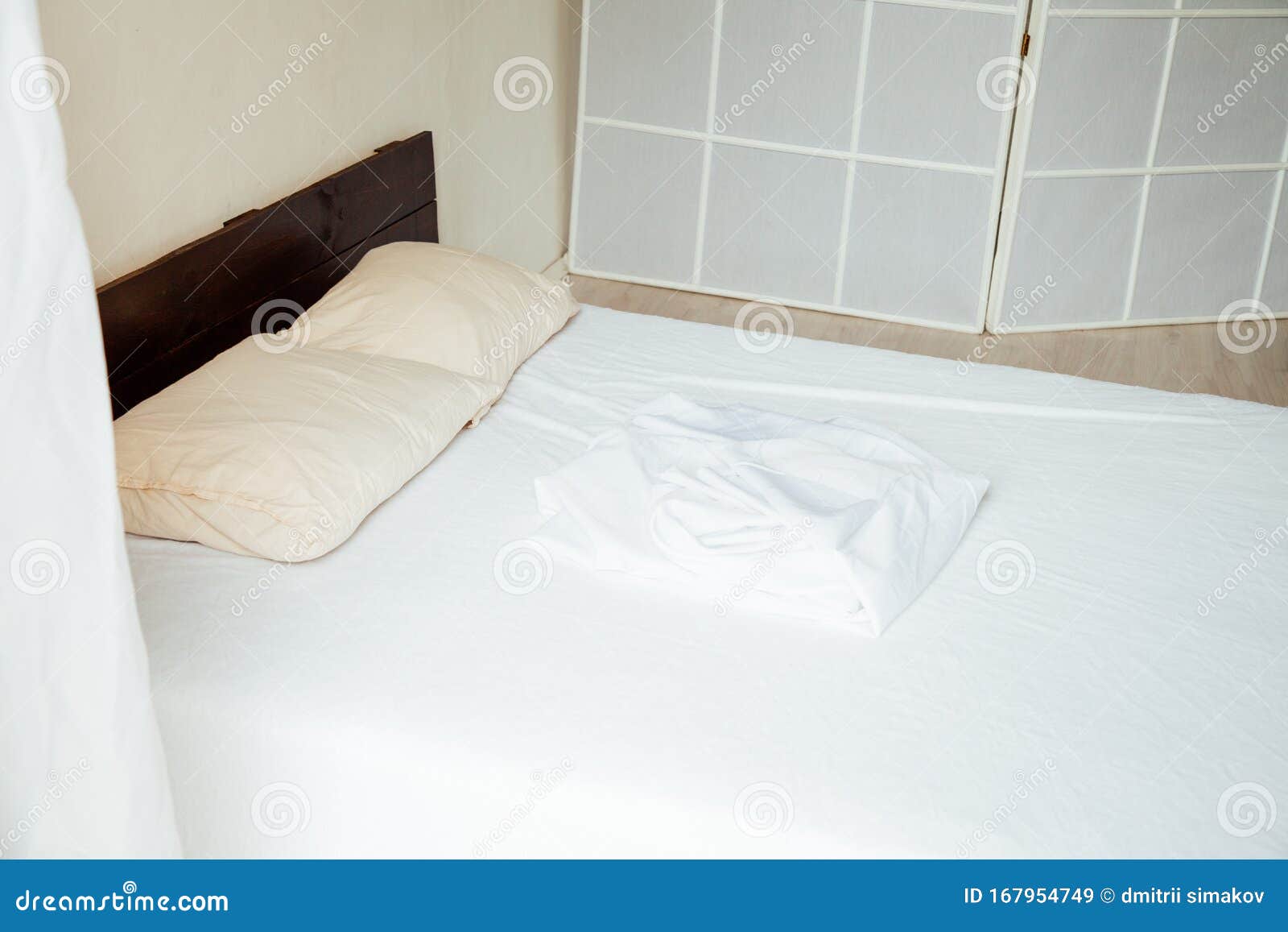 Empty Bed in the Interior of the White Bedroom after Sleeping in the ...