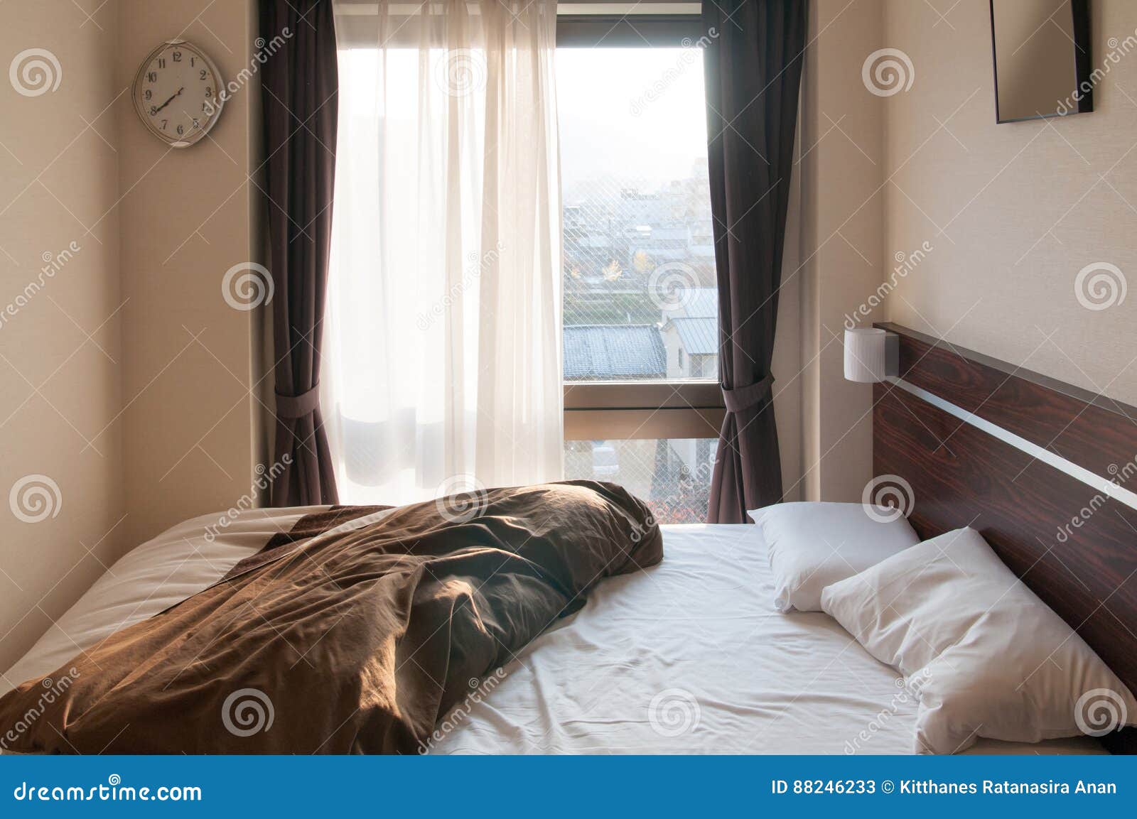 Bed Mattress and Pillows Mess Up Bedroom in the Morning. Stock Image ...