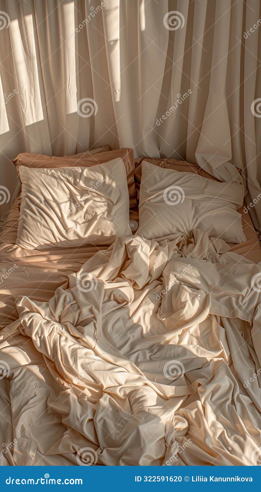 A Bed with White Sheets and Pillows, Emphasizing Its Disheveled State ...