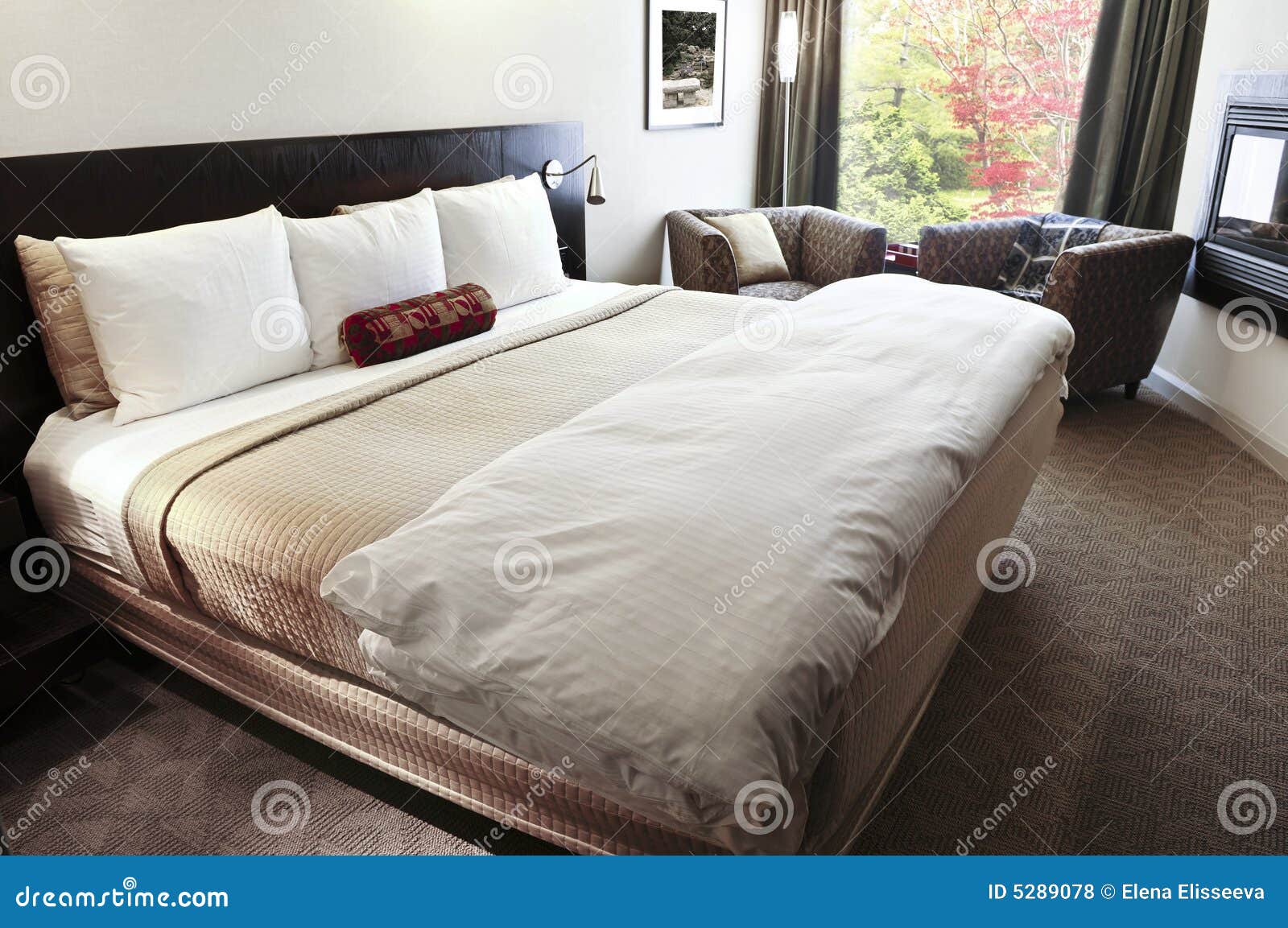 Bedroom with Comfortable Bed Stock Photo - Image of inviting ...