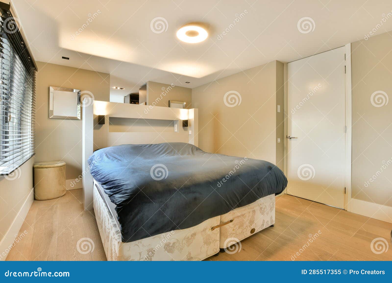 A Bedroom with a Large Bed and a Bunk Bed Stock Image - Image of window ...
