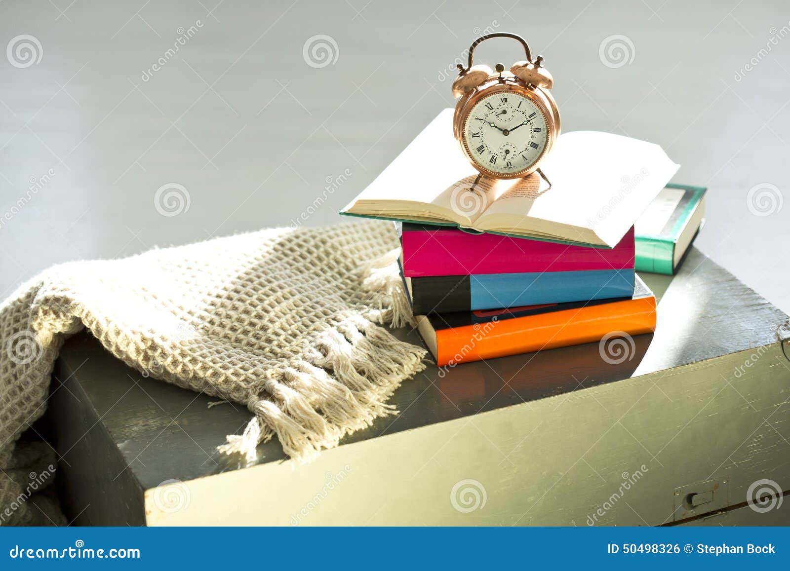 Bedtime Reading, Alarm Clock and Books Stock Photo - Image of people ...