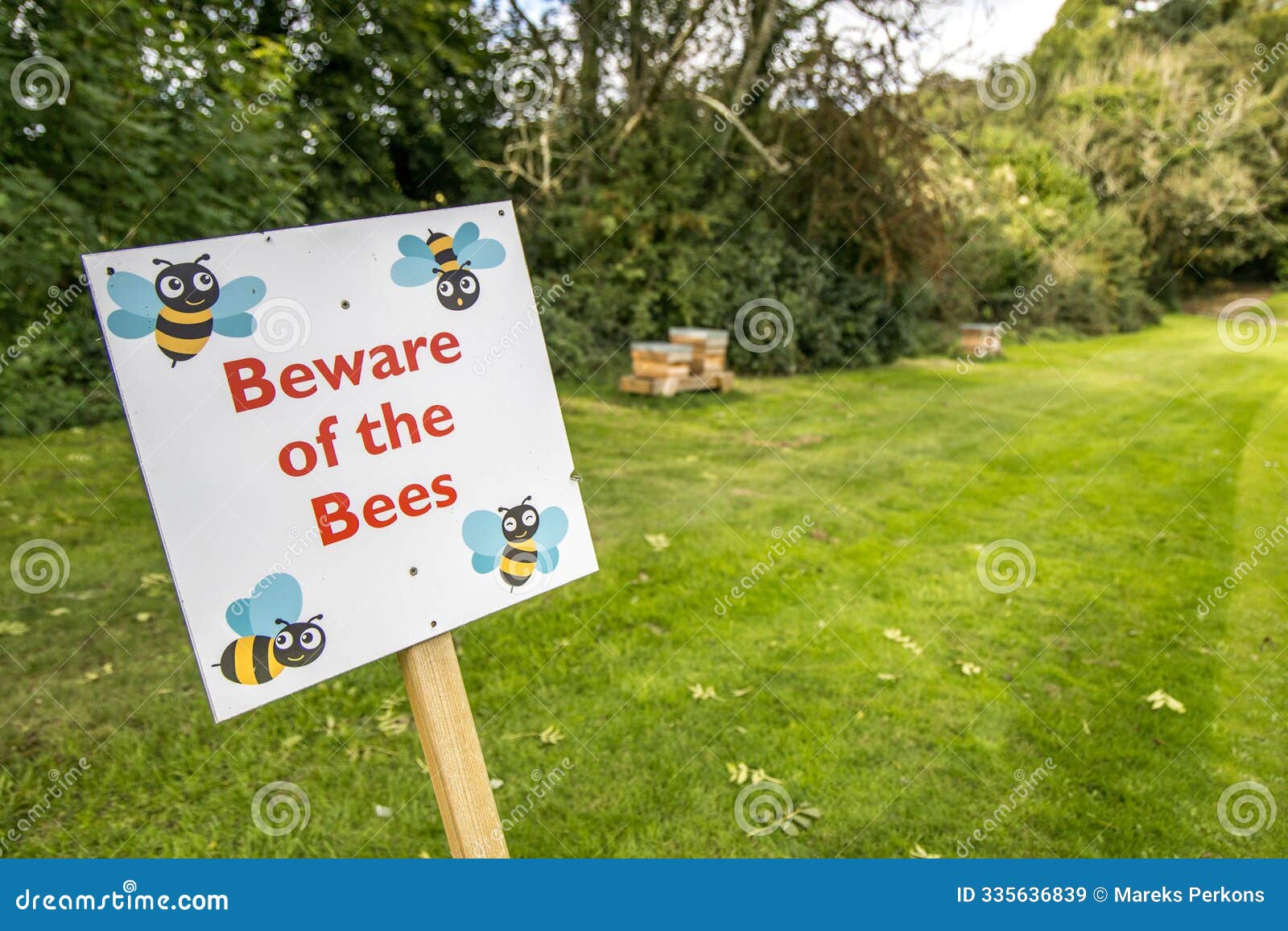 A Bee Awareness Warning Sign in Front of Bee Hives Stock Image - Image ...