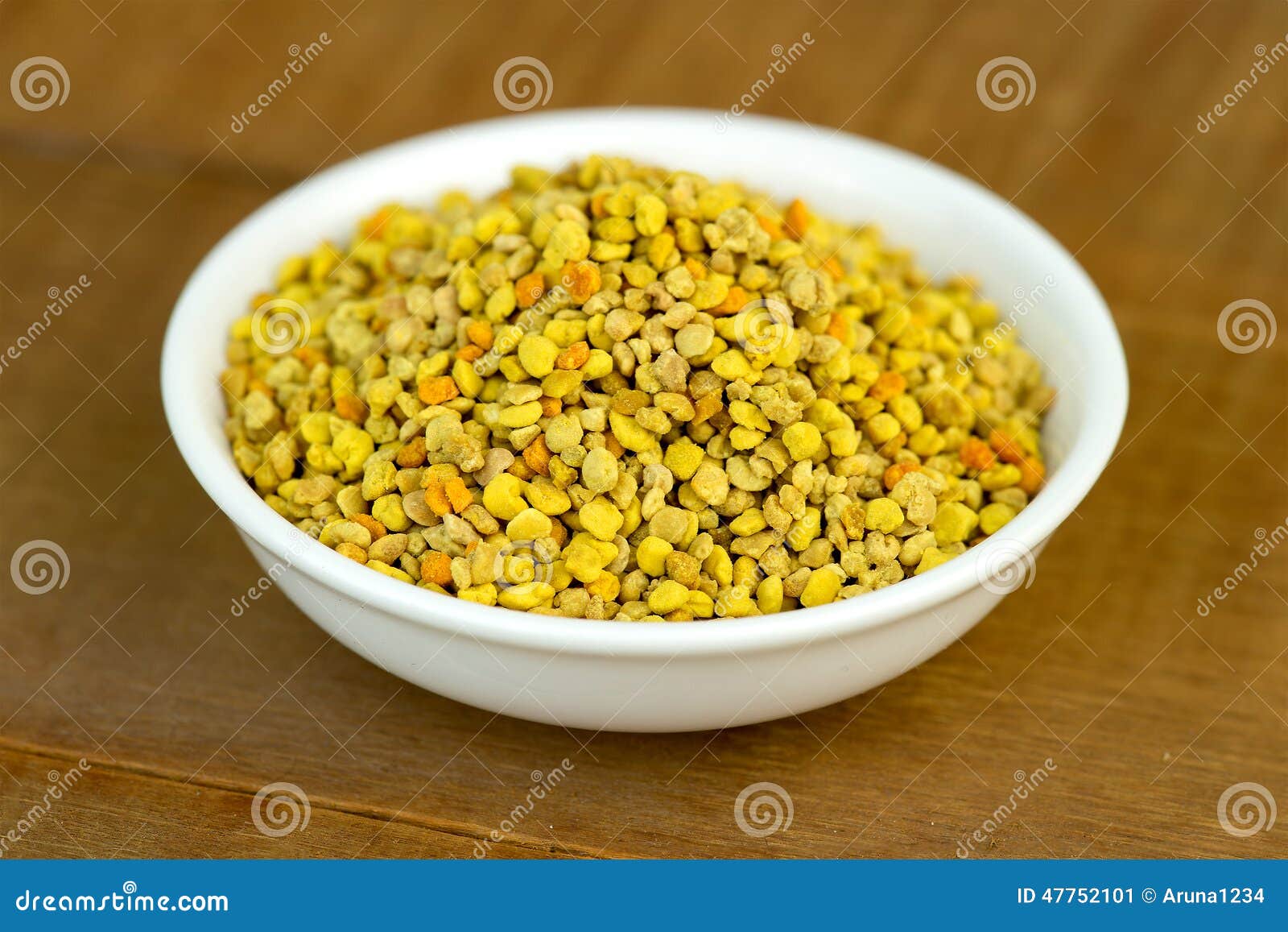 Bee Pollen Closeup in White Bowl on Wooden Table Stock Image - Image of ...