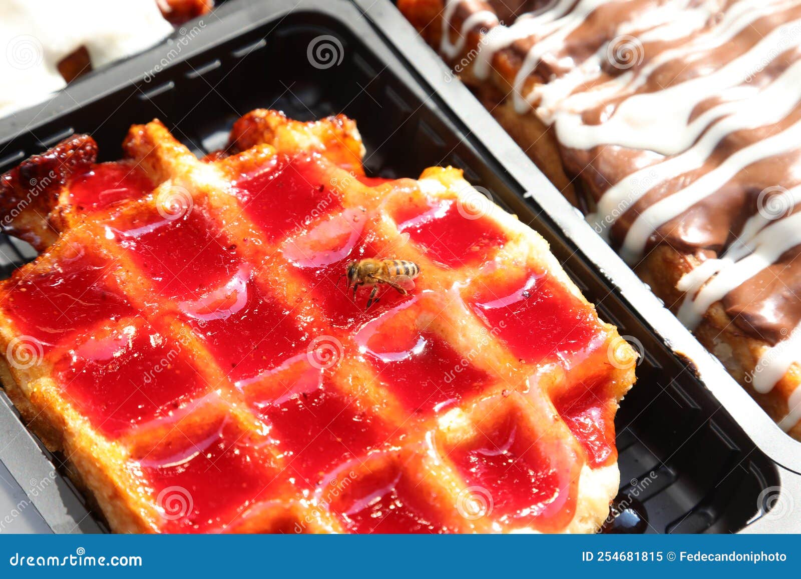 Bee Sucking Sugar from the Typical Belgian Dessert Called WAFFLE Stock ...