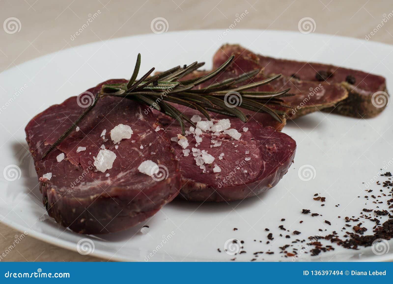 Beef Basturma on a Plate with Spices and Rosemary. Stock Photo - Image ...
