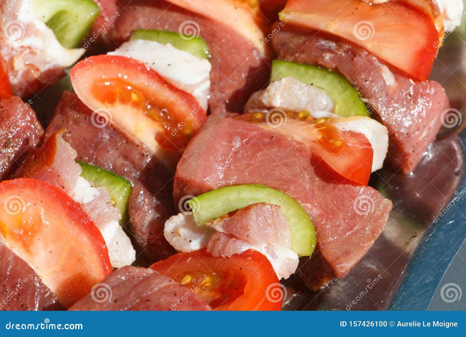 Beef brochette on a dish stock photo. Image of tomato - 157426100