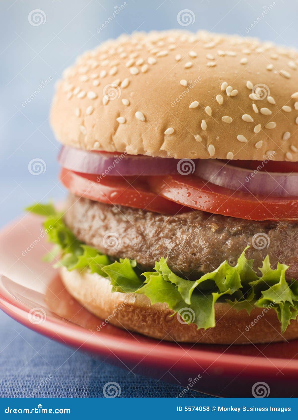 Beef Burger in a Sesame Seed Bun Stock Photo - Image of lettuce, supper ...