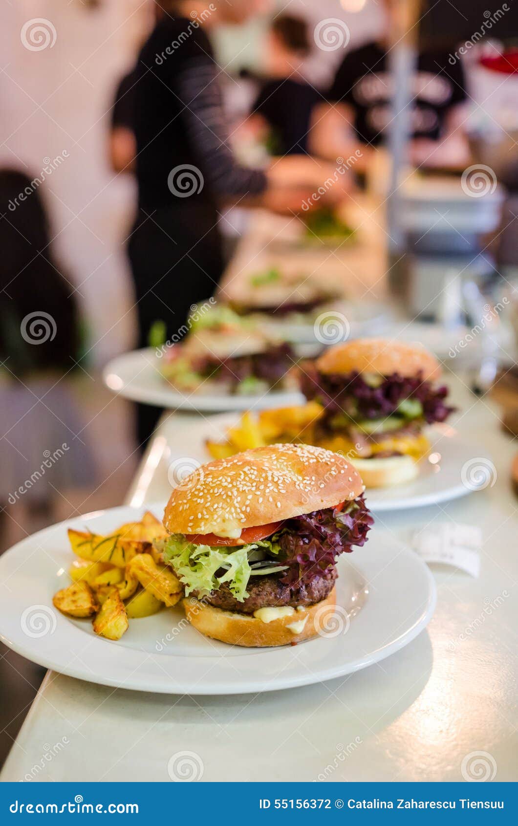 Beef Burgers in a Restaurant Stock Photo - Image of table, tomato: 55156372