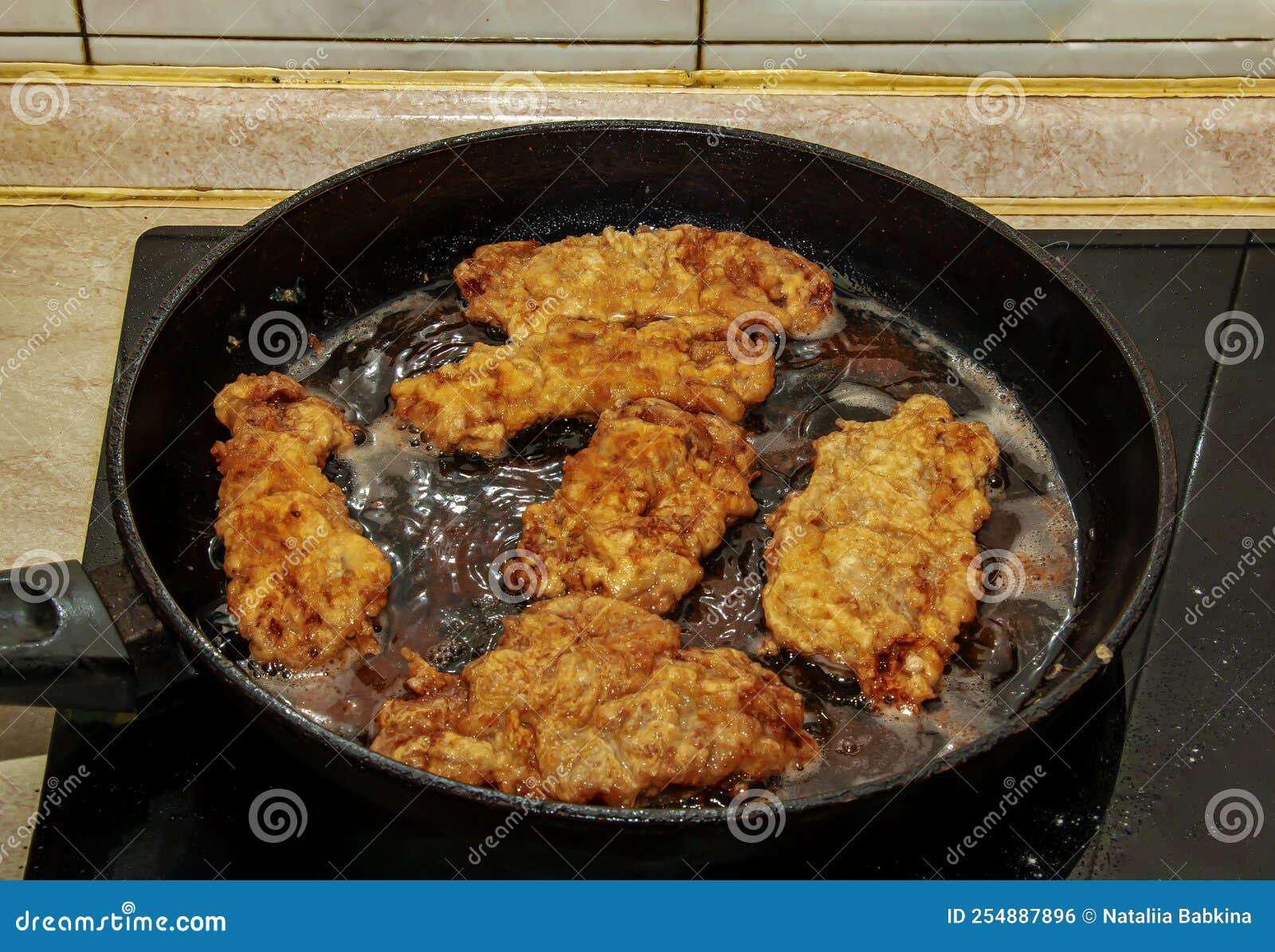 Beef Chops in a Pan on the Stove. the Process of Preparing Beef Chops ...