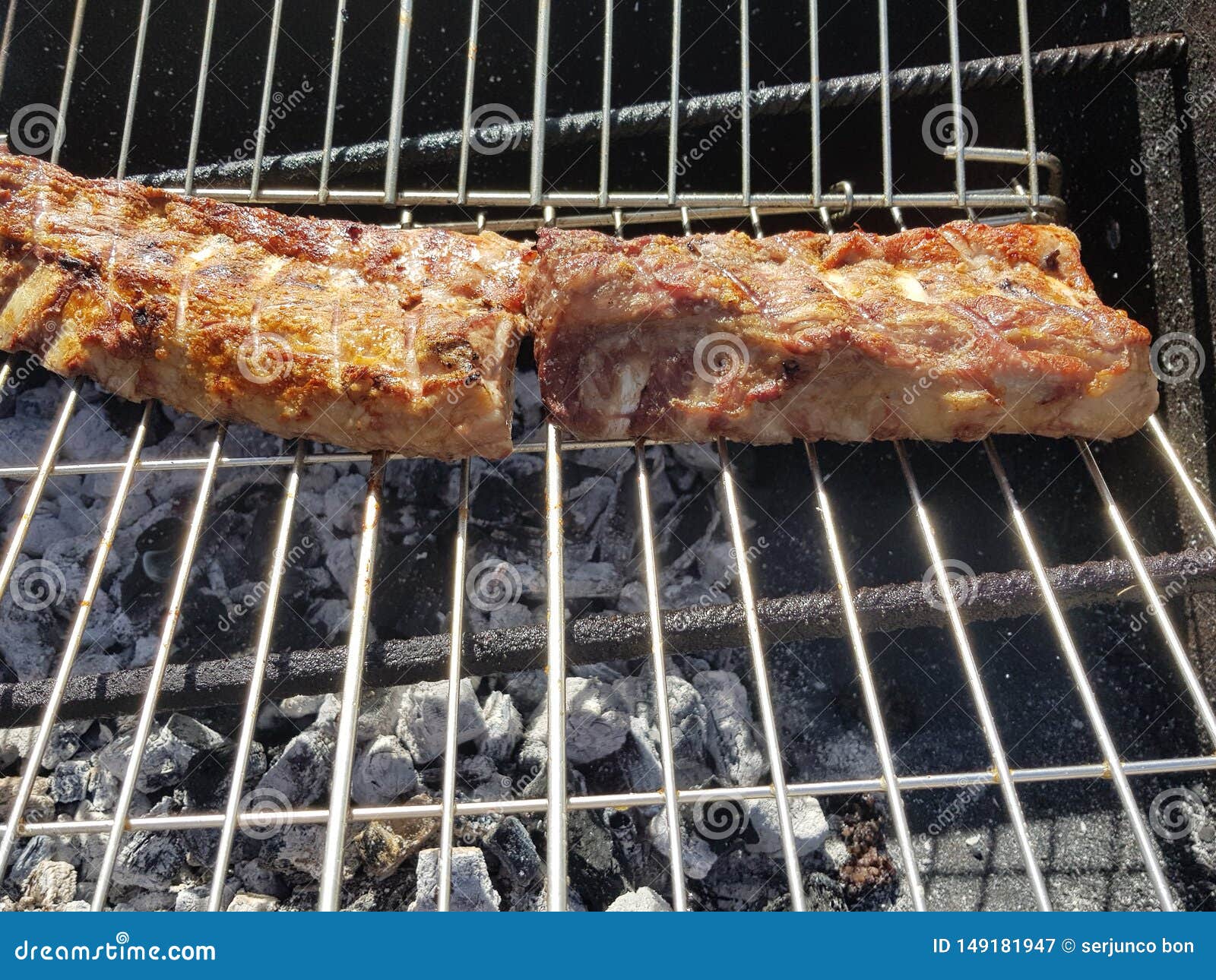 Beef and Cow Steak Grilled Next To Chorizo for Grilling Stock Image ...
