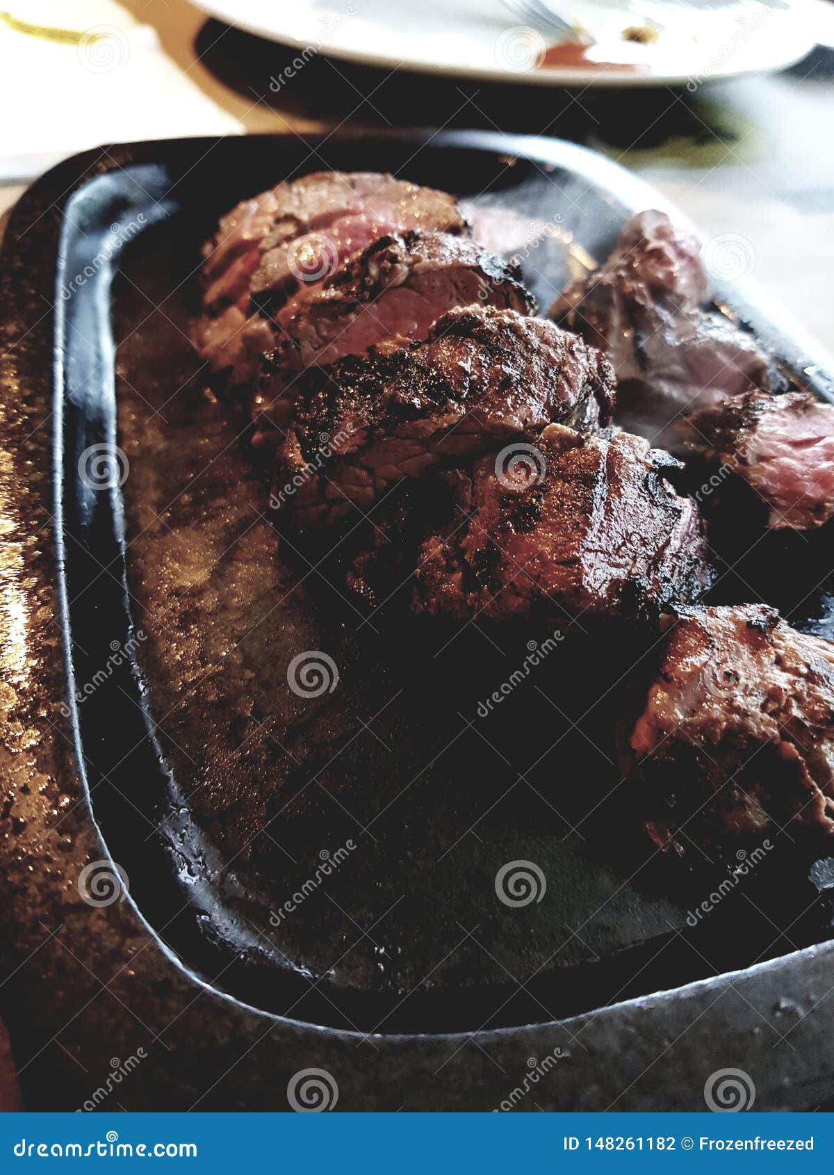 Beef cube roast on hot pan stock photo. Image of roast - 148261182