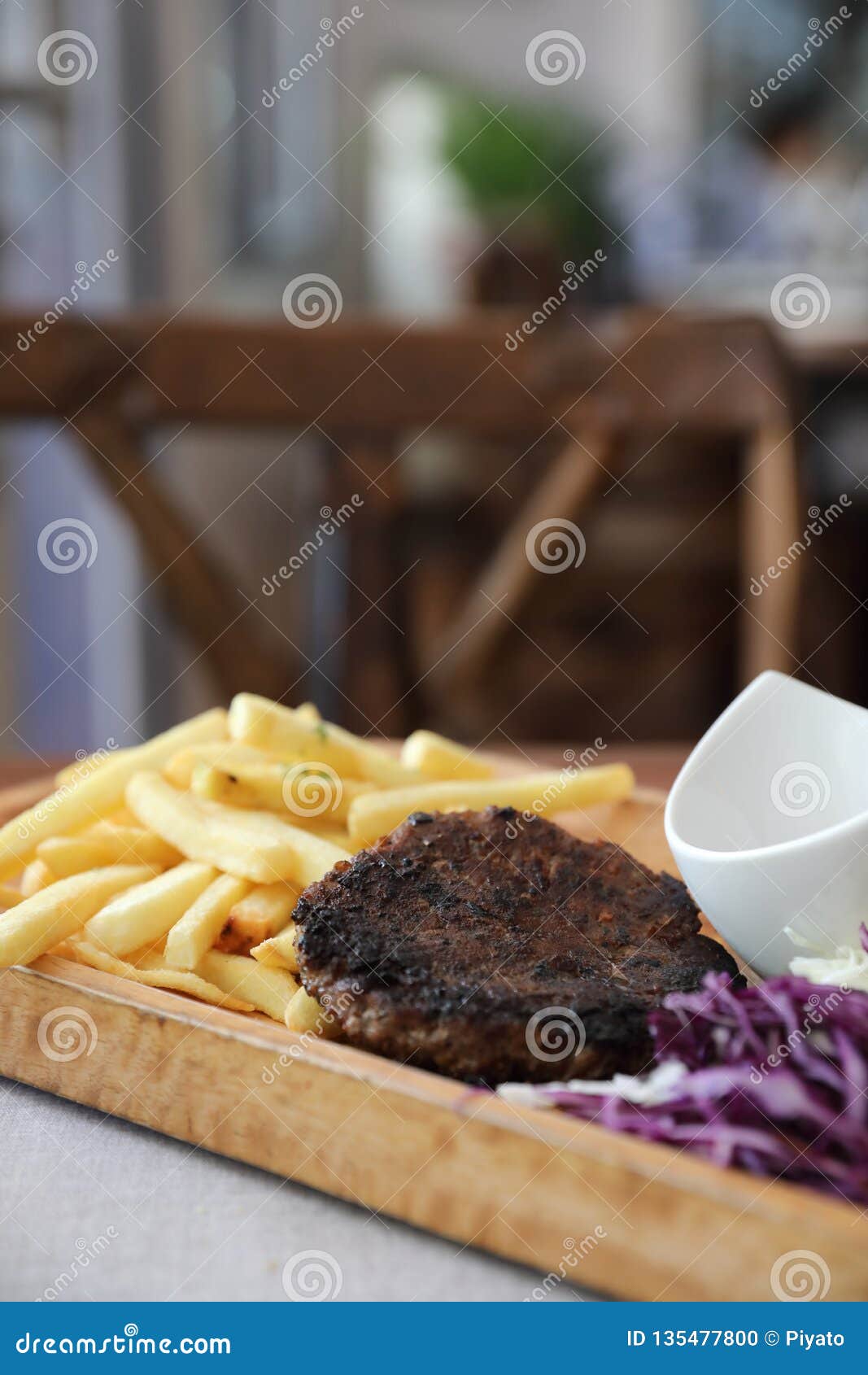 Beef Cutlet For Steak With Fires And Vegetables On Wooden Tray Stock ...