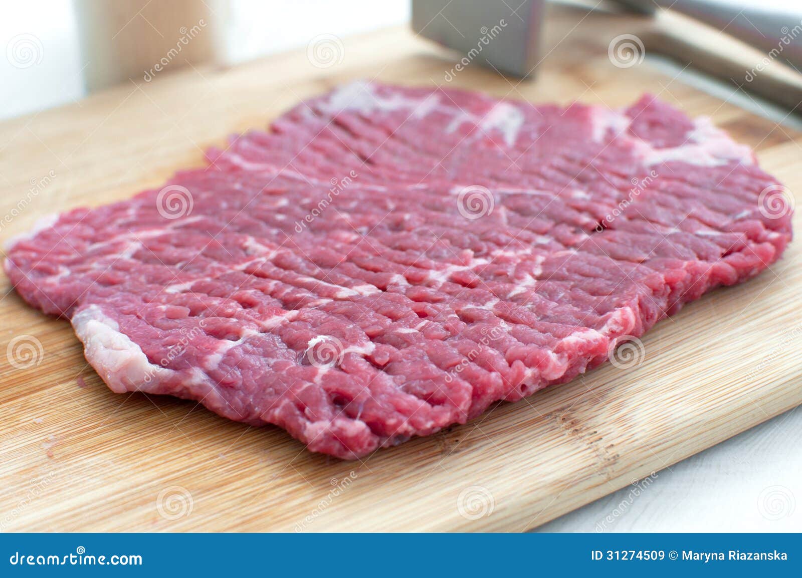 Beef Eye Round Steak on Cutting Board Stock Image - Image of slice ...