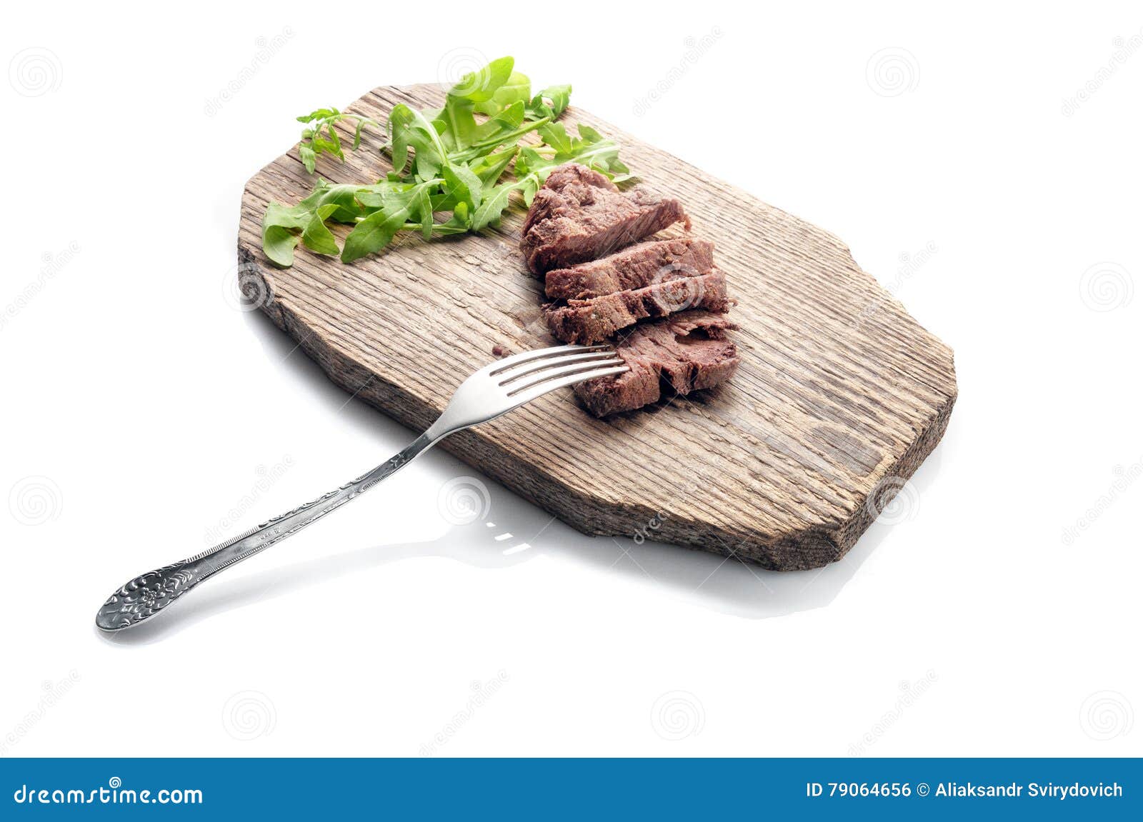 Beef with Fork on Wood Board. Isolated. Path Included Stock Photo ...
