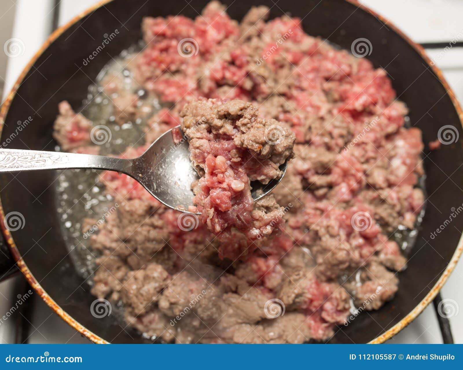 Beef fried in a pan stock image. Image of beef, bolognese - 112105587