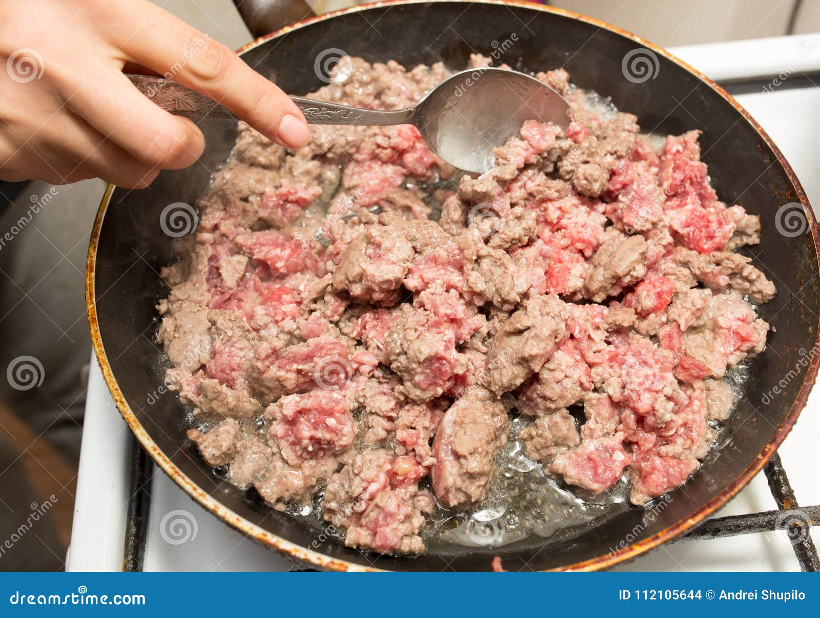 Beef fried in a pan stock photo. Image of stir, meat - 112105644