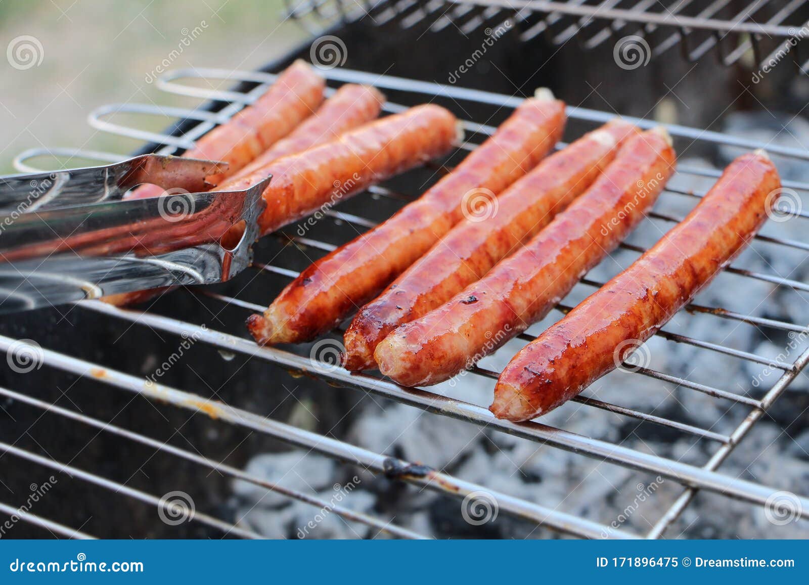 Beef Fried Sausages on Fire on a Portable Barbecue Stock Image - Image ...
