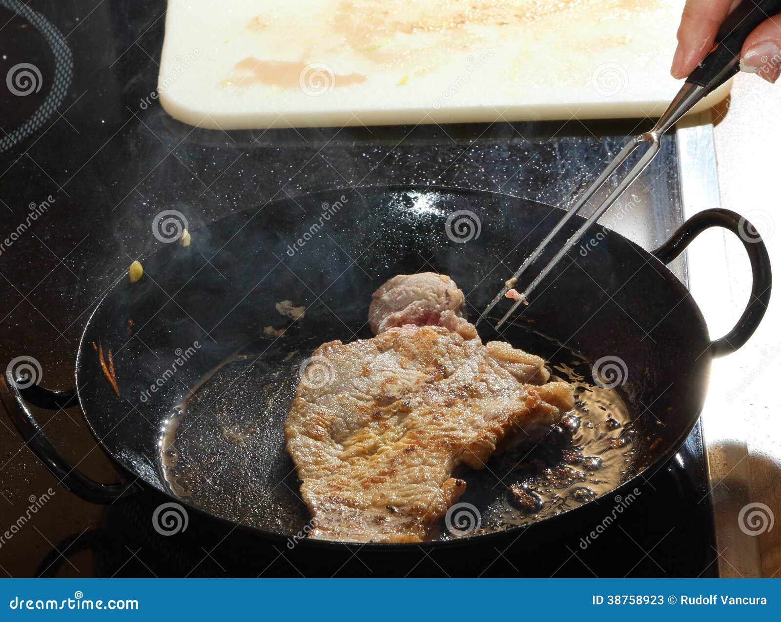 Beef in frying pan stock image. Image of food, steaming - 38758923