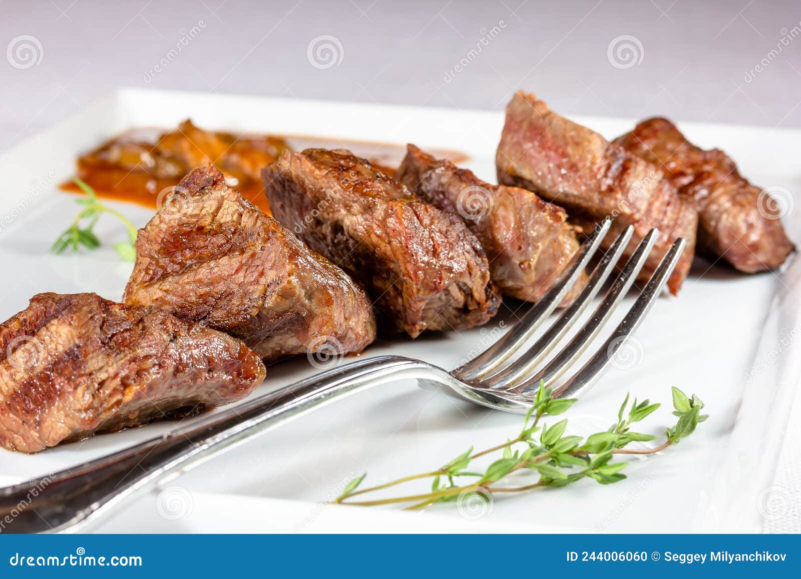 Beef Kebab with Tomato Sauce with Vegetables is on a Plate Stock Photo ...