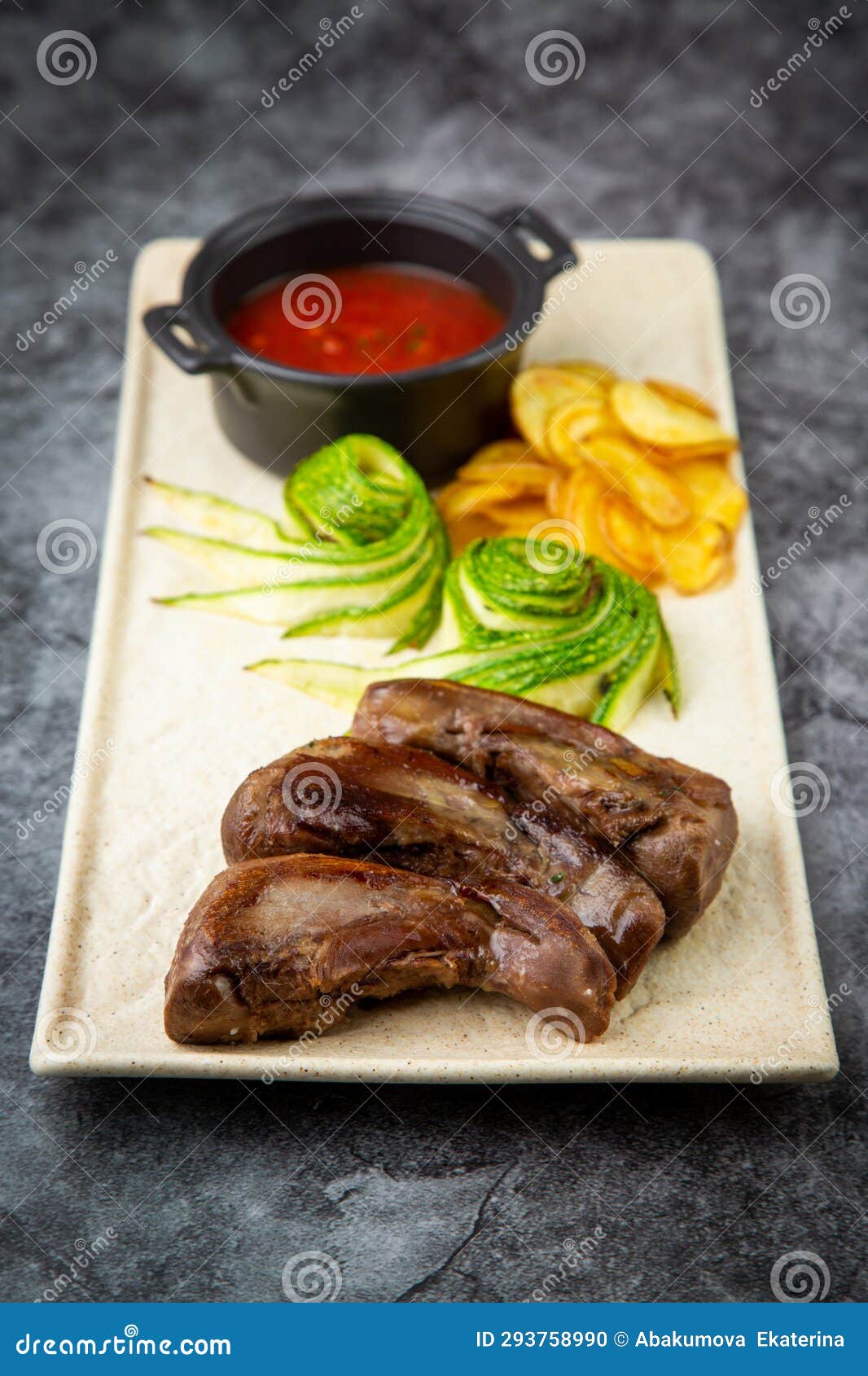 Beef Meat with Chips, Cucumbers and Barbecue Sauce, Side View Stock ...