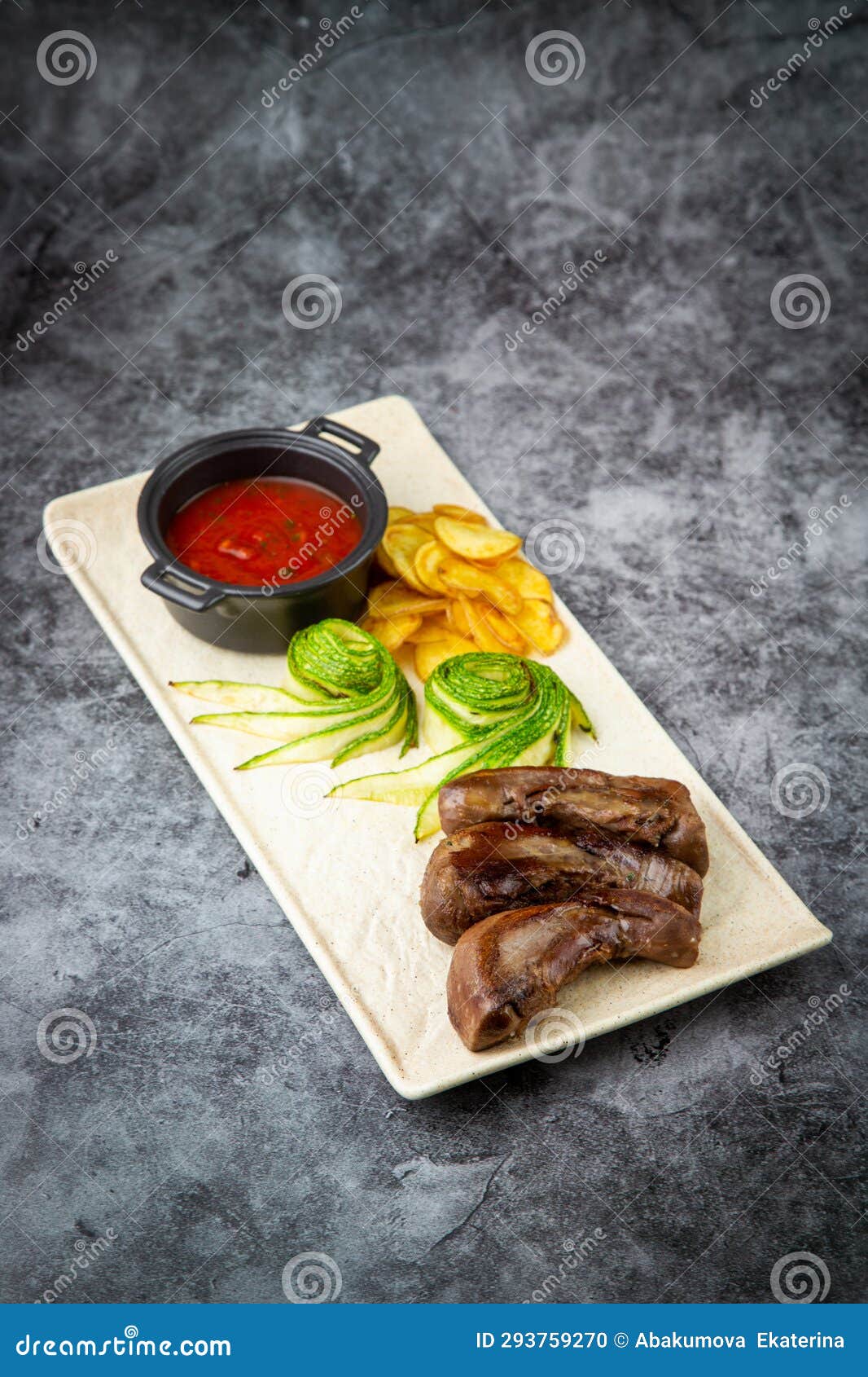 Beef Meat with Chips, Cucumbers and Barbecue Sauce, Side View Stock ...