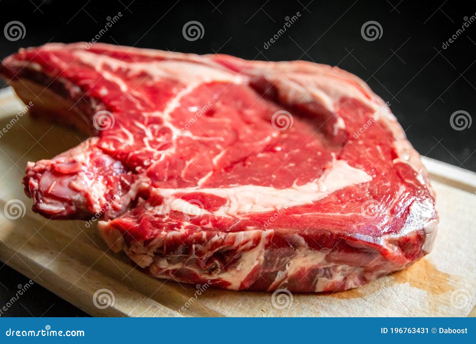 Beef Prime Rib on a Cutting Board Stock Image - Image of beef, juicy ...