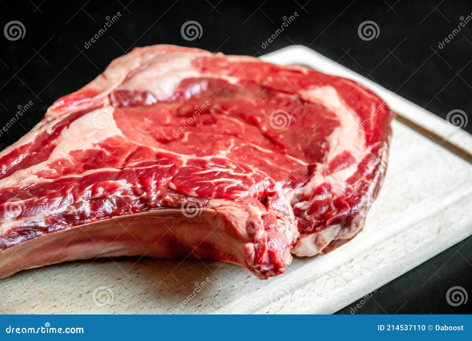 Beef Prime Rib on a Cutting Board Stock Photo - Image of food, isolated ...
