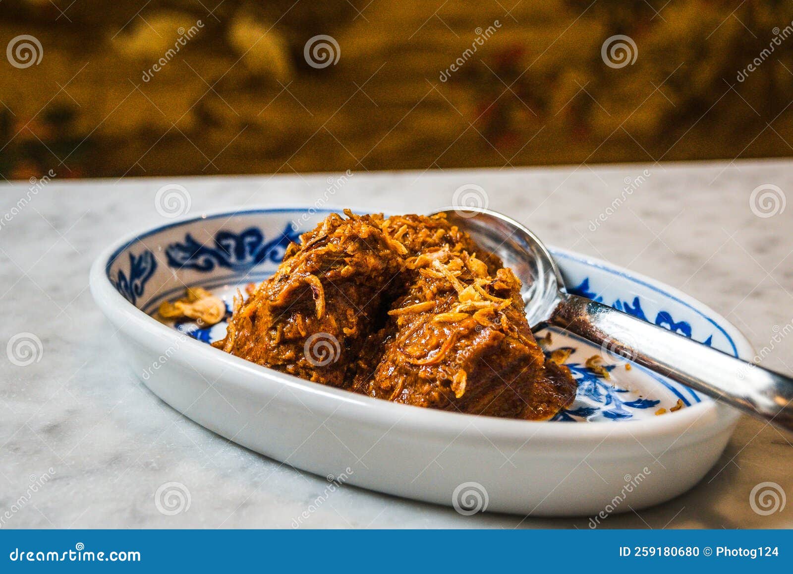 Beef Rendang Dish of Beef Chunks Simmered in Coconut Sauce Stock Photo ...