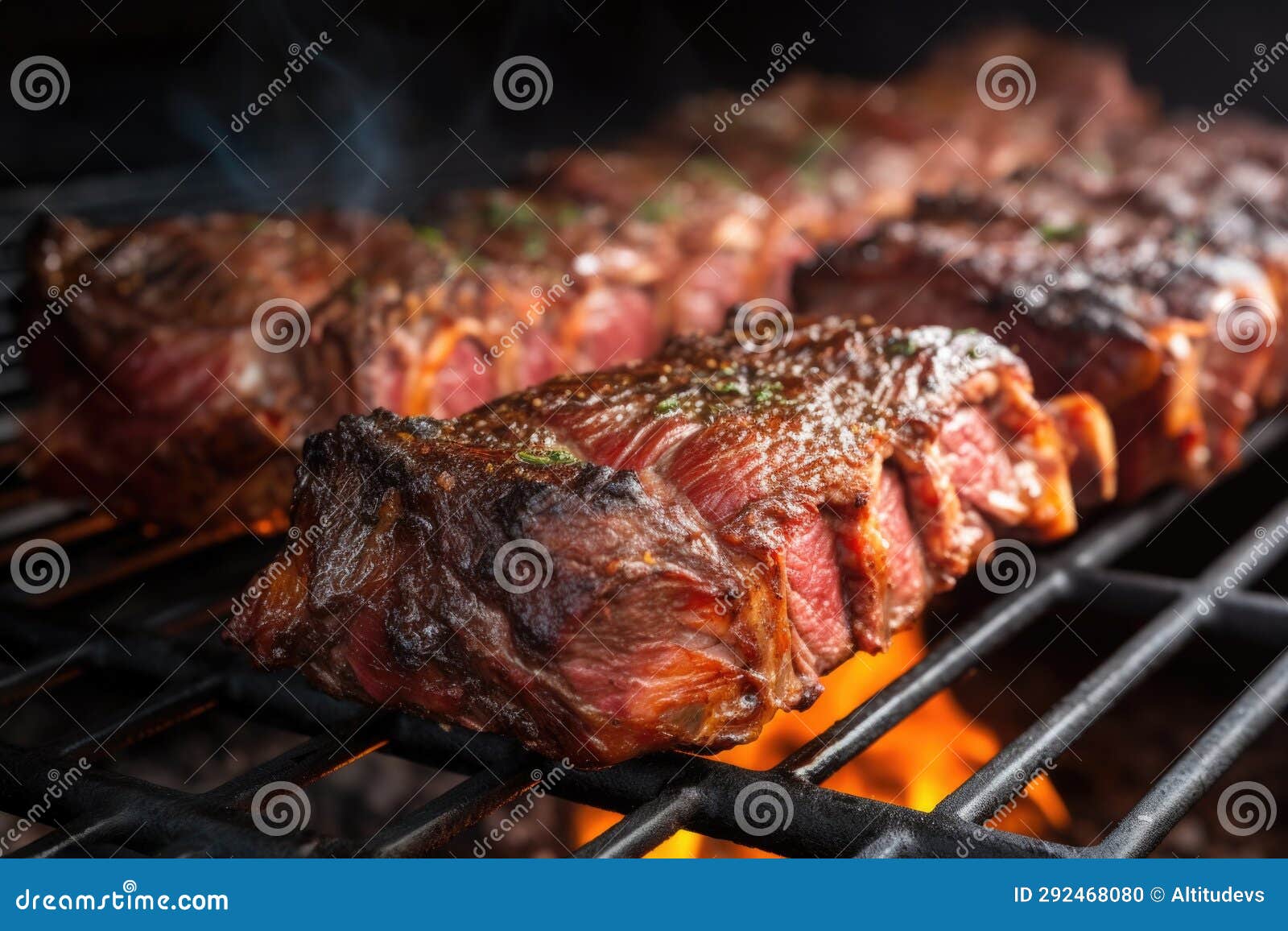 Beef Ribs Getting a Nice Sear on a Grill Rotisserie Stock Photo - Image ...